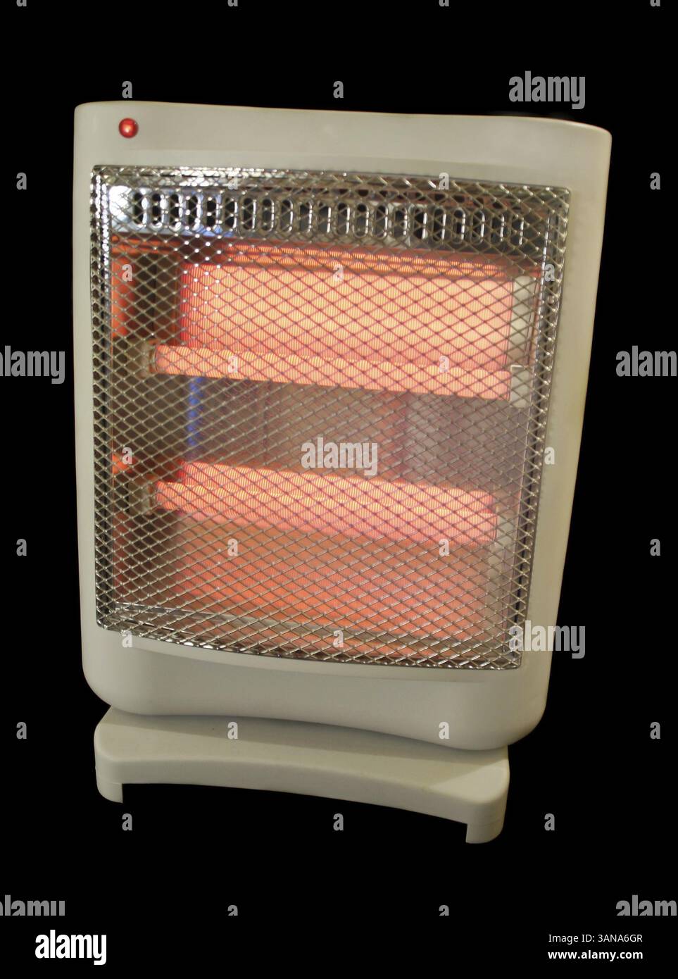 Electric radiator heater turned on with bars glowing Stock Photo - Alamy