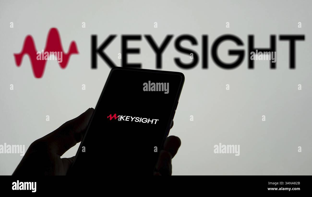 Dhaka, Bangladesh 23 March 2025: Mobile phone with webpage of US company Keysight Technologies ...