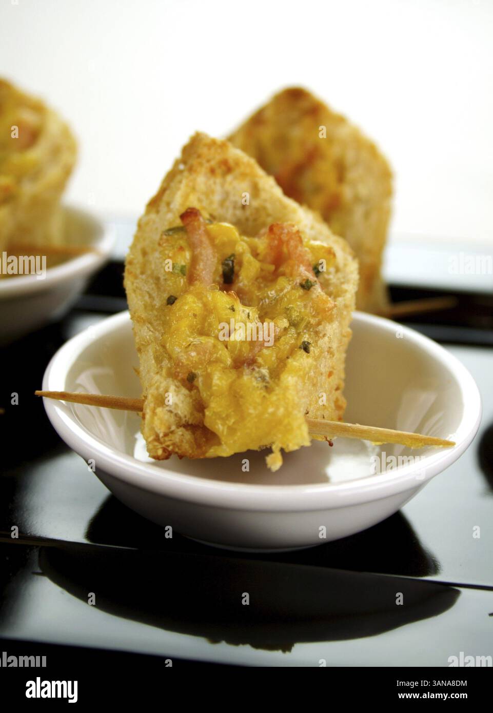 Baked triangles made with corn, ham and cheese with wholemeal bread ...