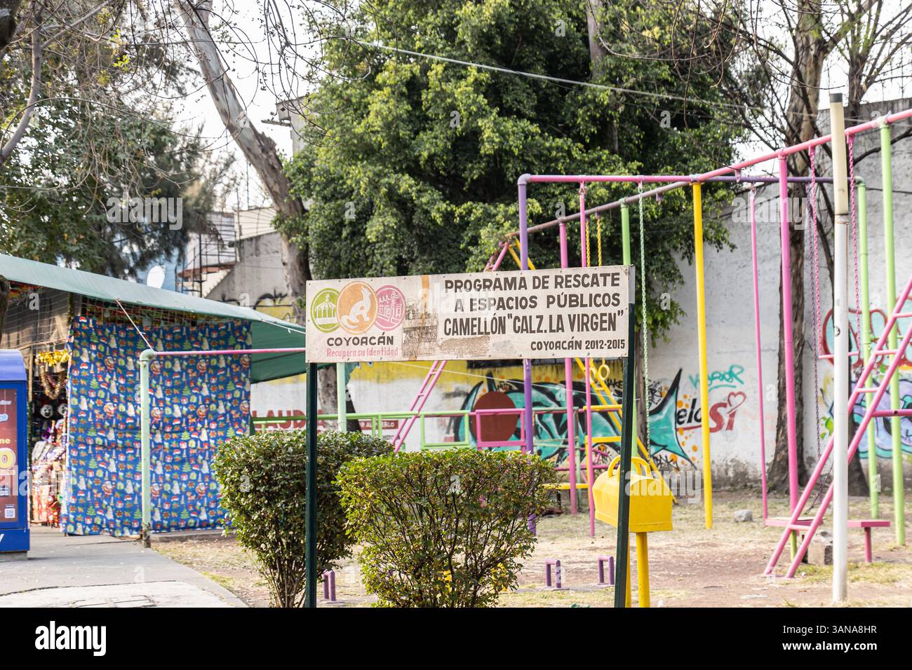 Sign public space program at park. Translation : Public space rescue ...