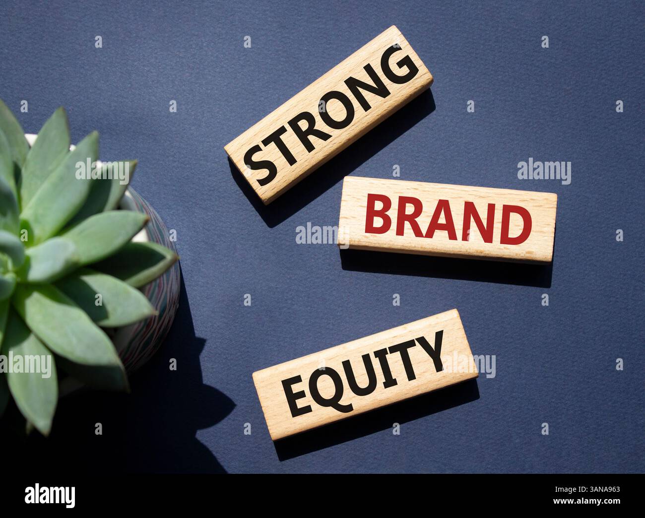 Strong Brand Equity symbol. Concept words Strong Brand Equity on wooden ...
