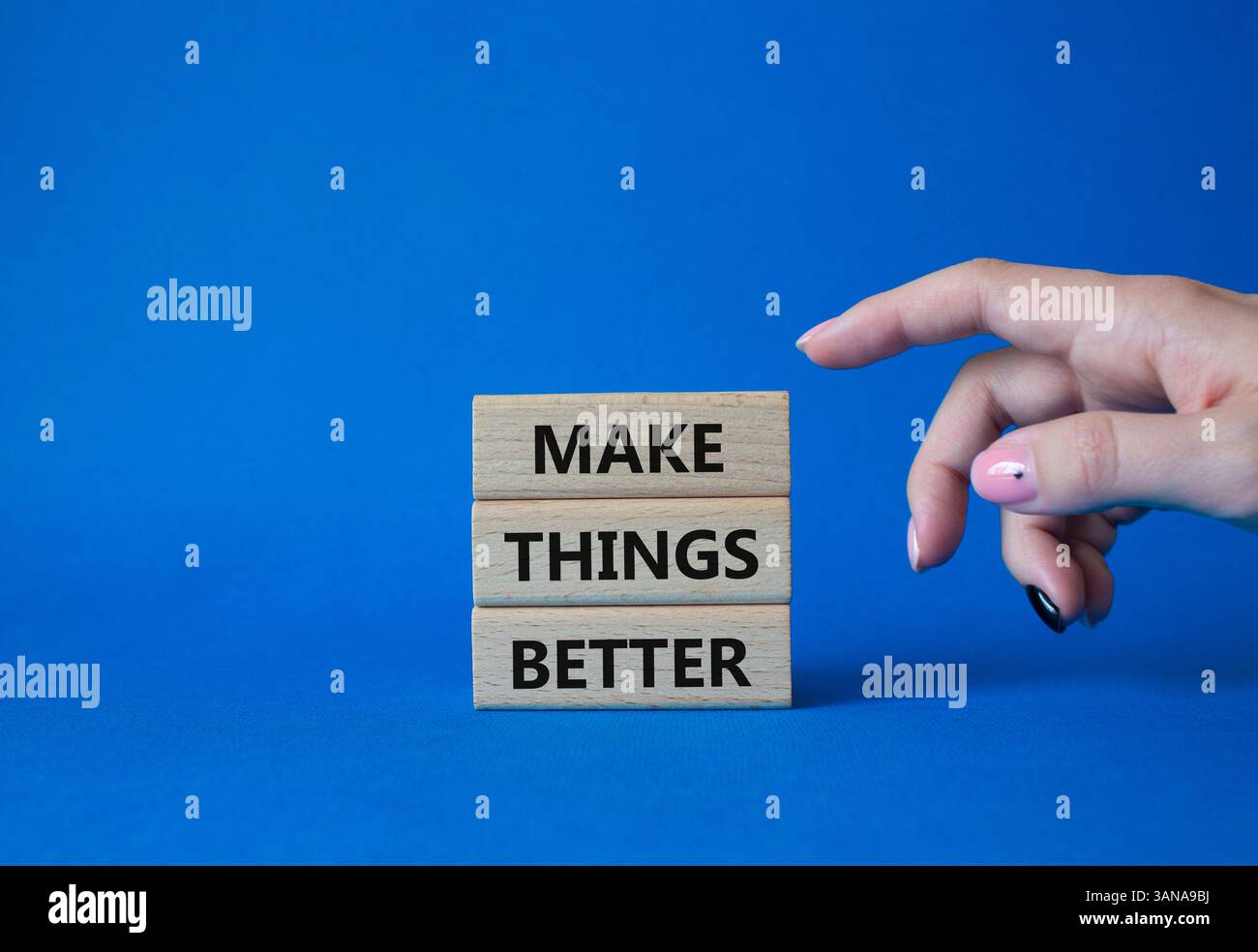 Make things better symbol. Concept word Make things better on wooden ...