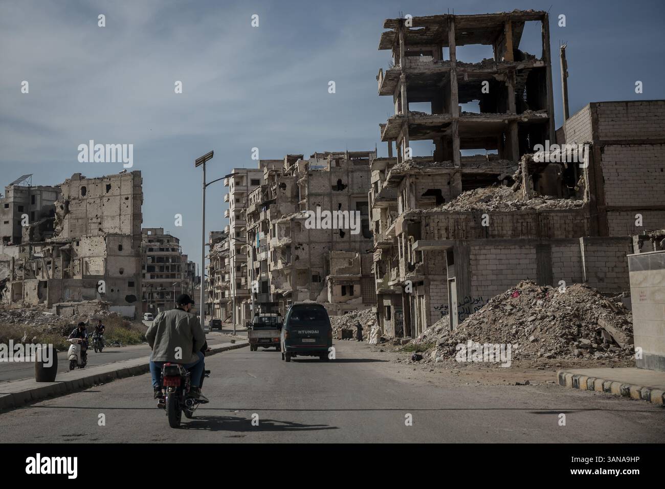 Homs, Syria. 25th Mar, 2025. Traffic through central Homs, which is ...