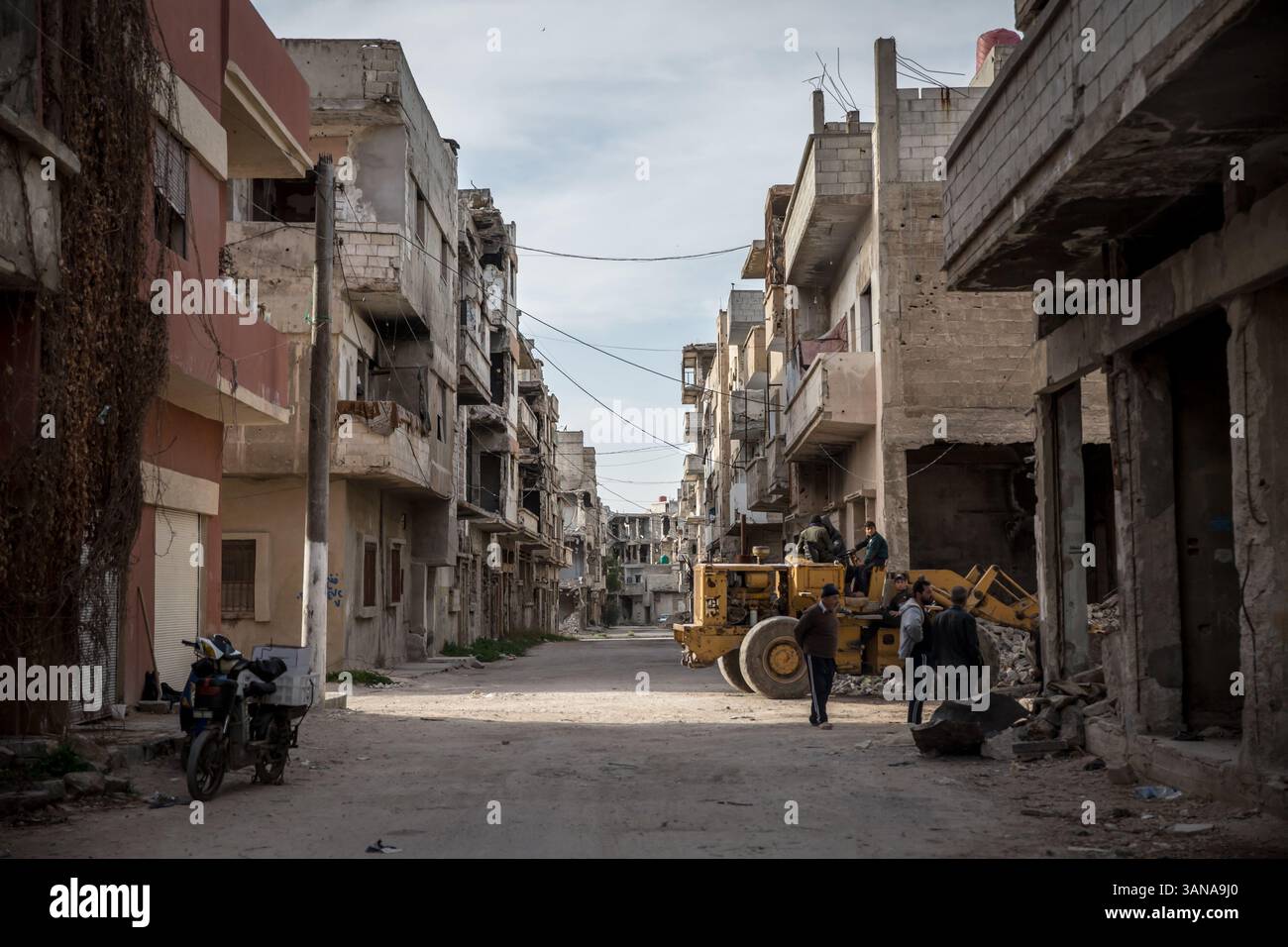 Homs, Syria. 25th Mar, 2025. Work is ongoing to remove rubble from ...