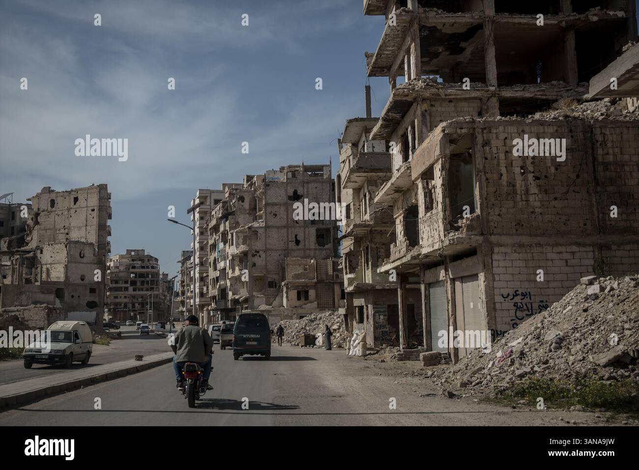 Homs, Syria. 25th Mar, 2025. Traffic through central Homs, which is ...