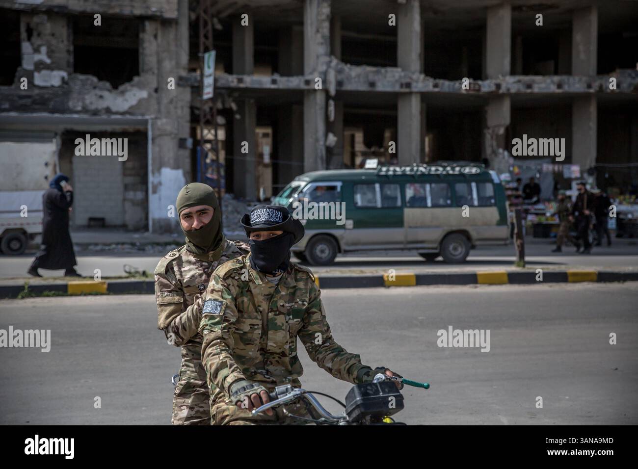 Homs, Syria. 25th Mar, 2025. Members of the new Syrian security forces ...