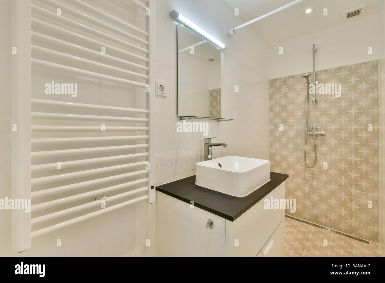 A sleek and contemporary bathroom featuring a stylish basin, modern ...