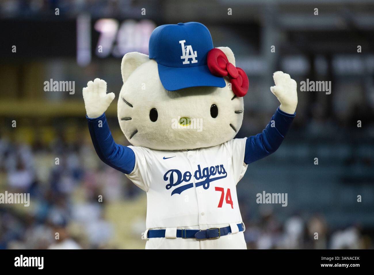 Hello Kitty waves before a baseball game between the Los Angeles ...