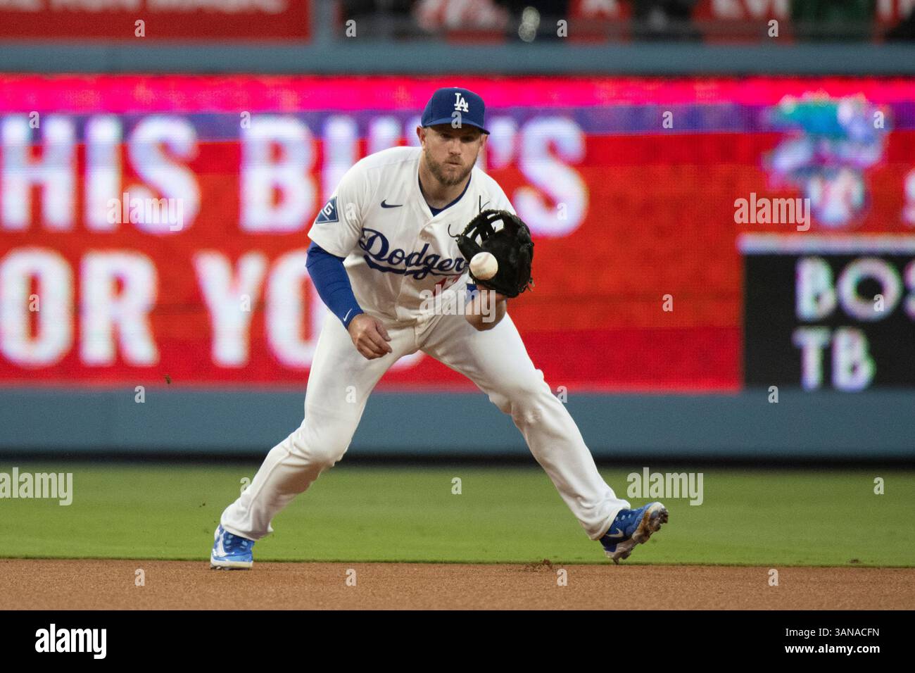 Los Angeles Dodgers third baseman Max Muncy fields the ball during a ...