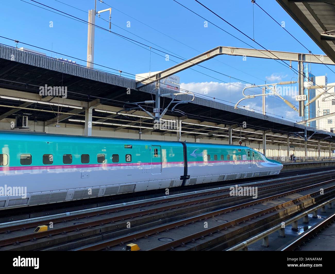 Scenic view of an E5 Series Shinkansen bullet train on the tracks of ...