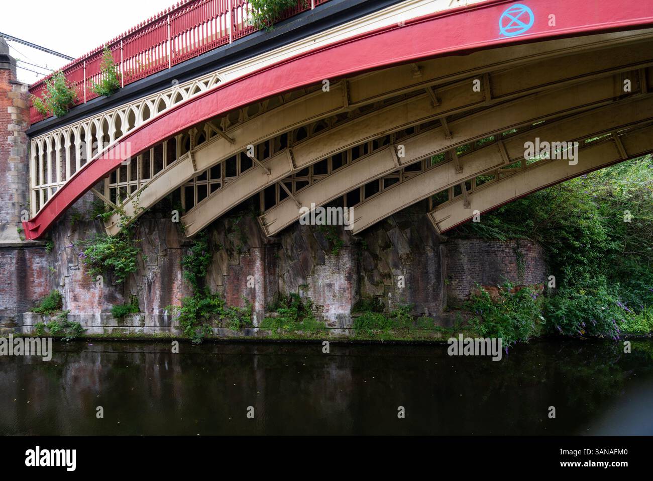 Canal bridge at Deansgate, Manchester showing iron beams underneath ...