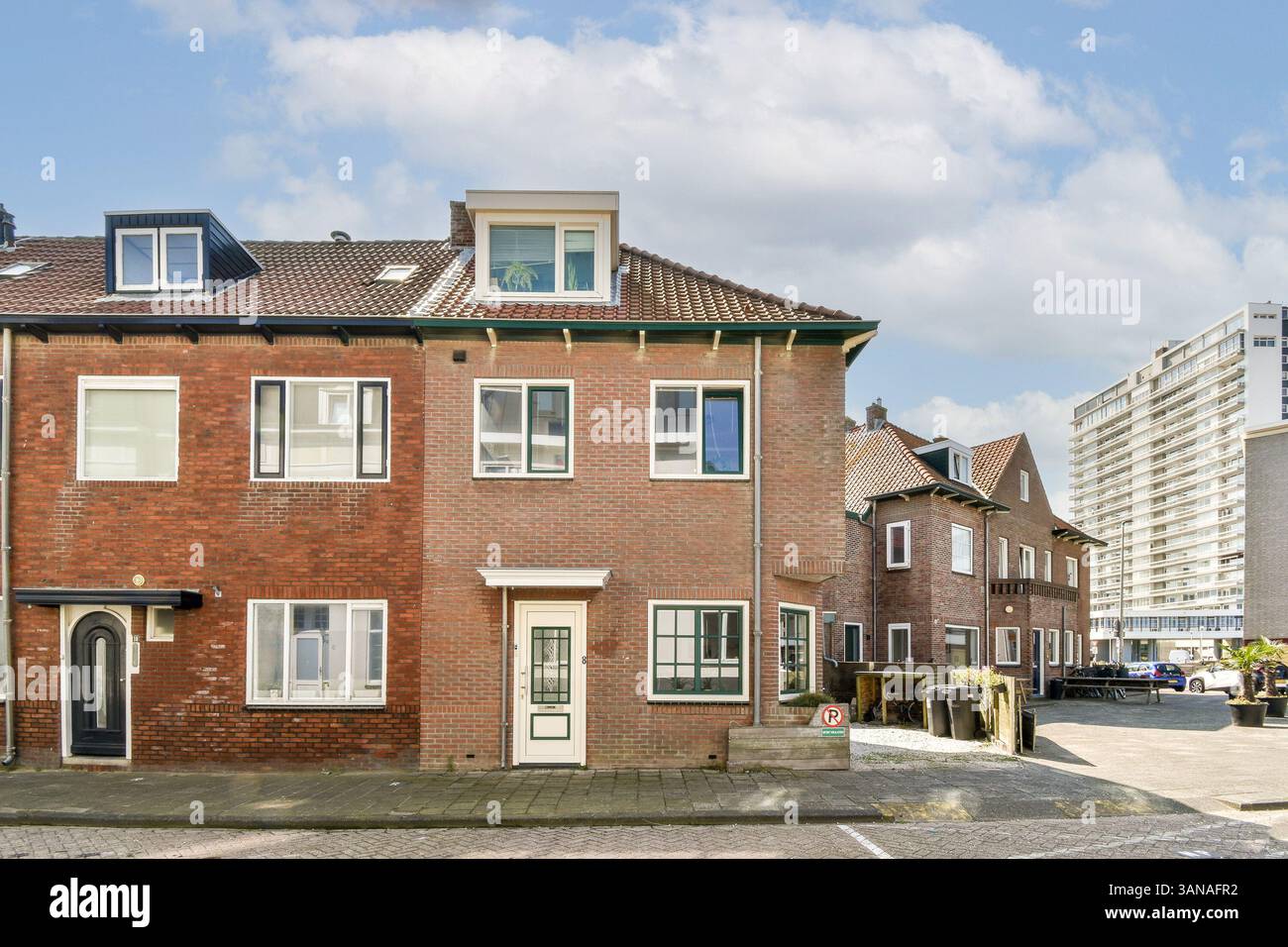 A view of modern and traditional residential buildings side by side in ...