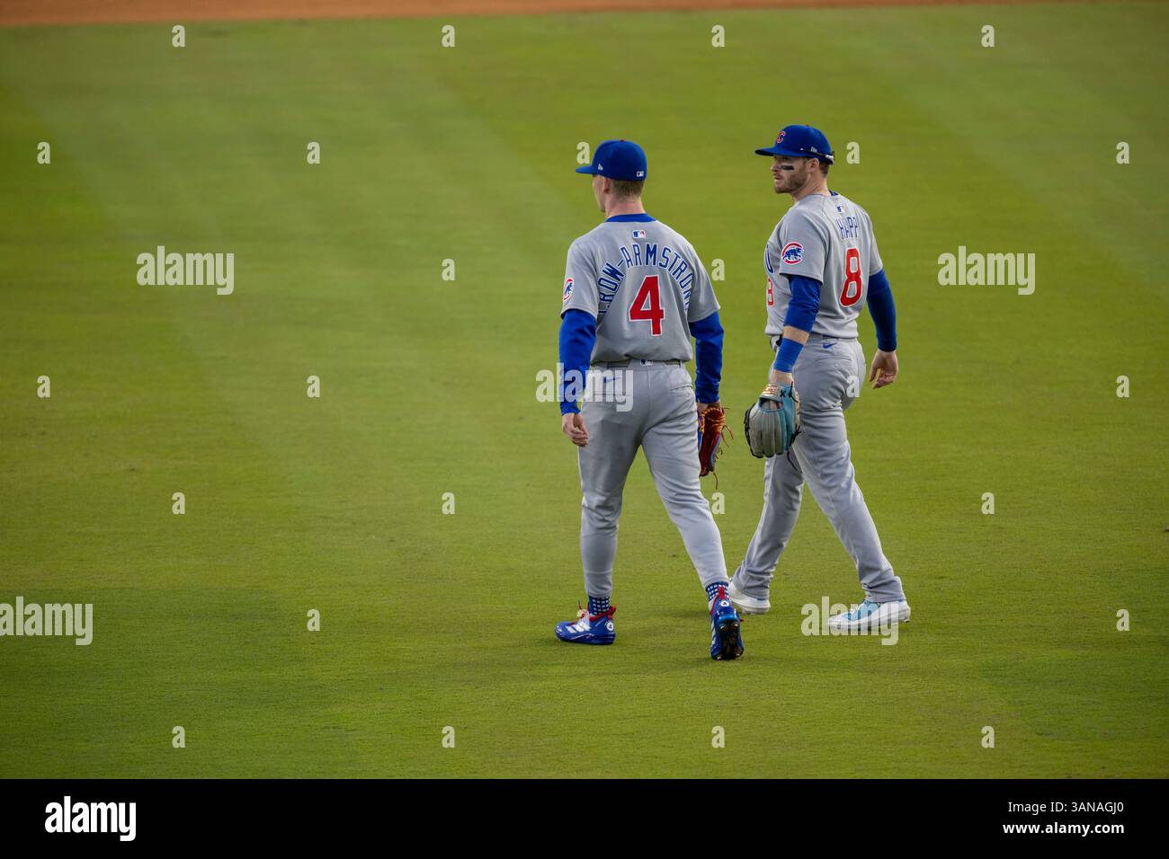 April 13, 2025: Pete Crow-Armstrong (4) and Ian Happ (8) on their way ...
