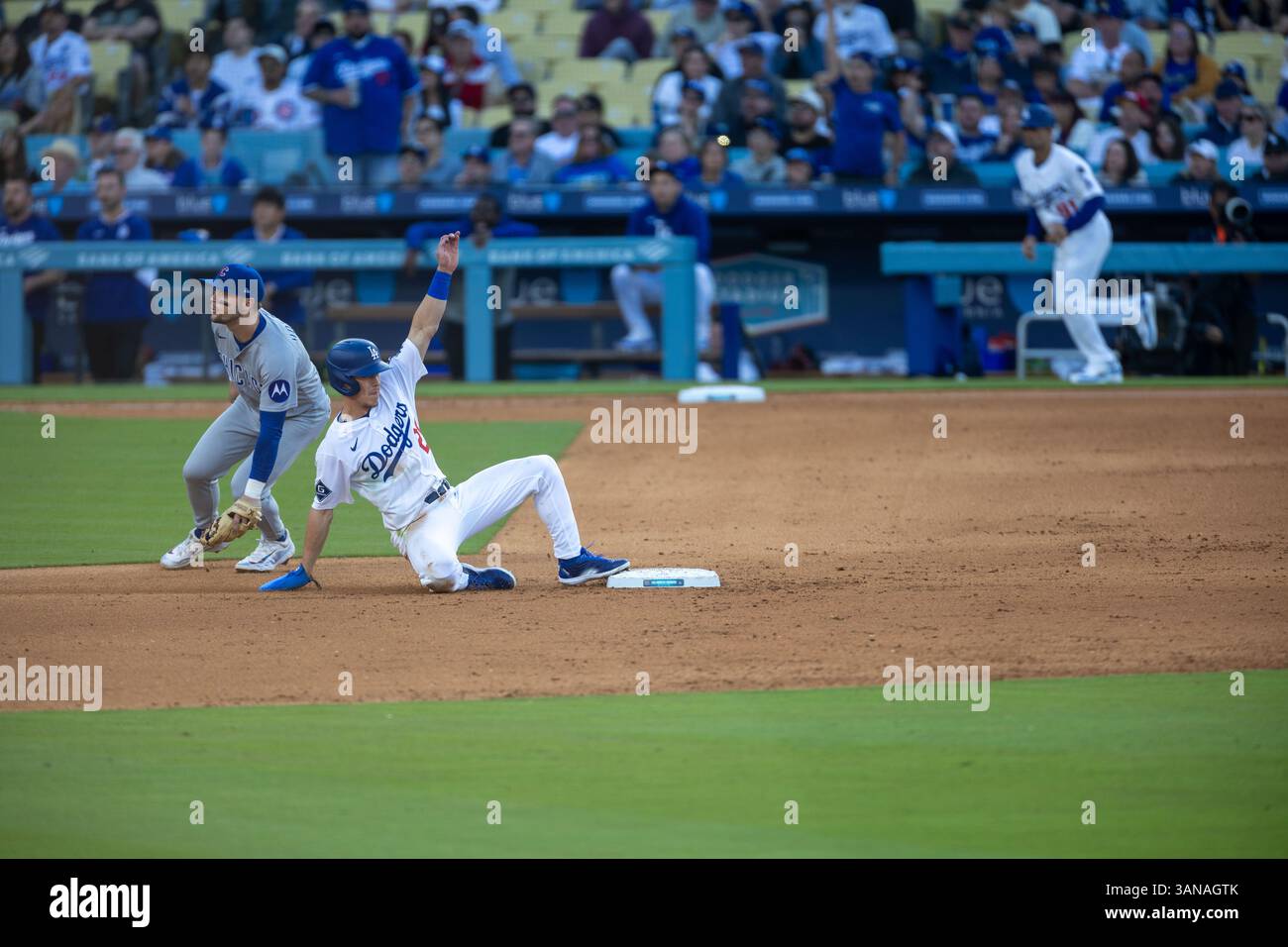 April 13, 2025: Dodger outfielder Tommy Edman (25) slides safely into second base during a game ...