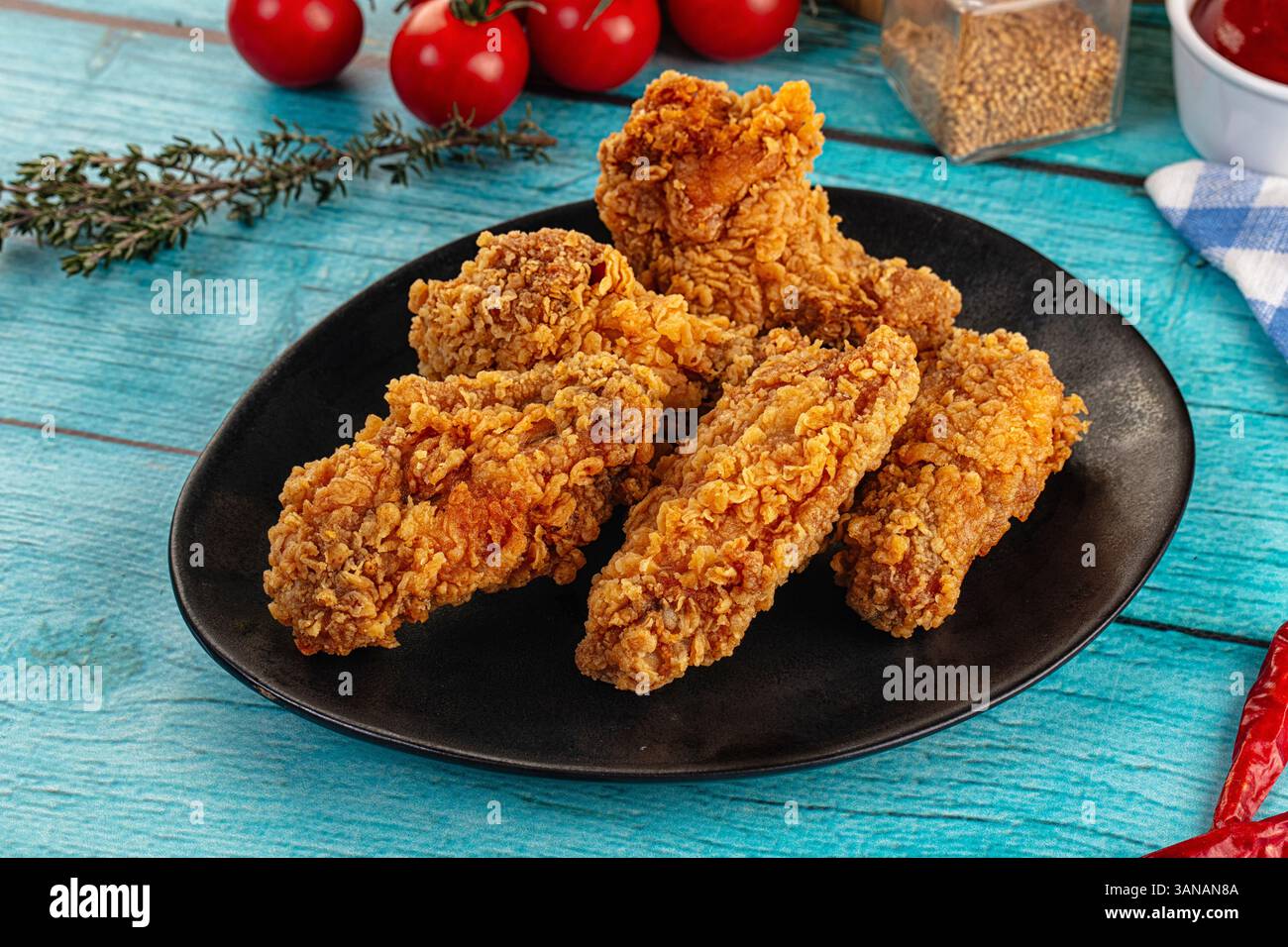 Golden crispy fried spicy chicken wings Stock Photo - Alamy