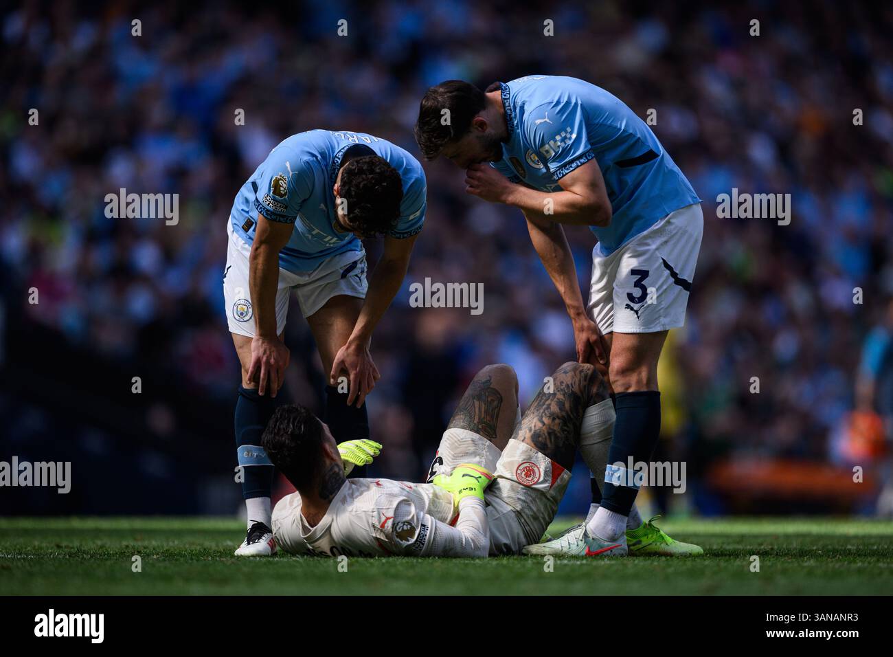 MANCHESTER, ENGLAND - APRIL 12: injured goalkeeper Ederson during the ...
