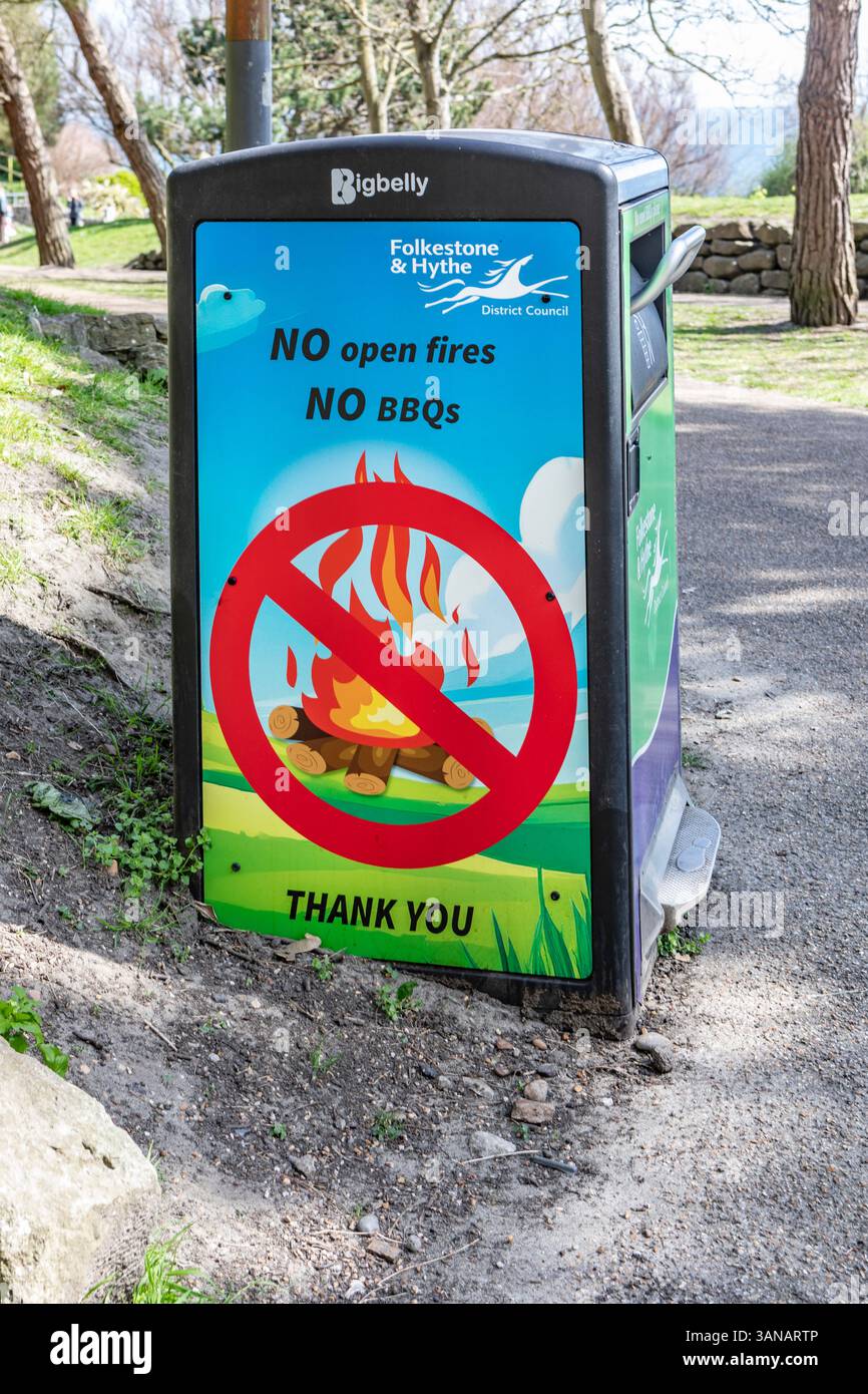 A refuse bin with a No open fires of BBQ's warning sign Stock Photo - Alamy
