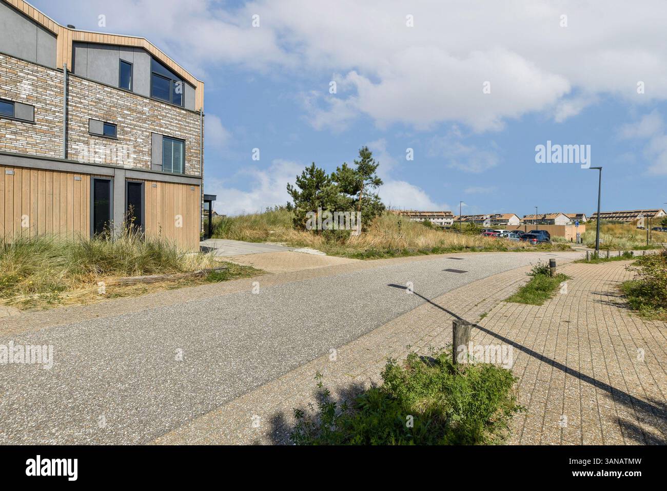 A contemporary structure blends with the natural landscape, featuring ...