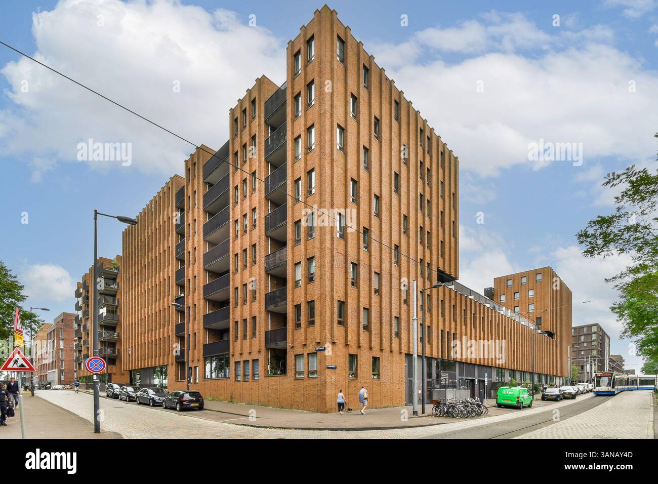 Contemporary multi-story brick building showcases angular design ...