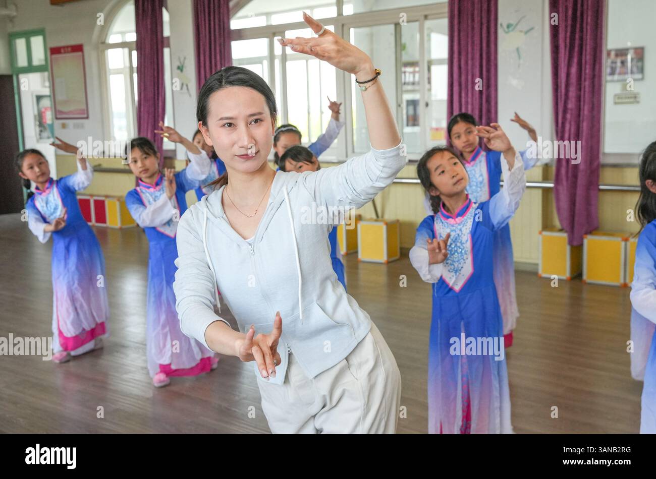 HUZHOU, CHINA - APRIL 15, 2025 - A traditional Chinese opera teacher ...