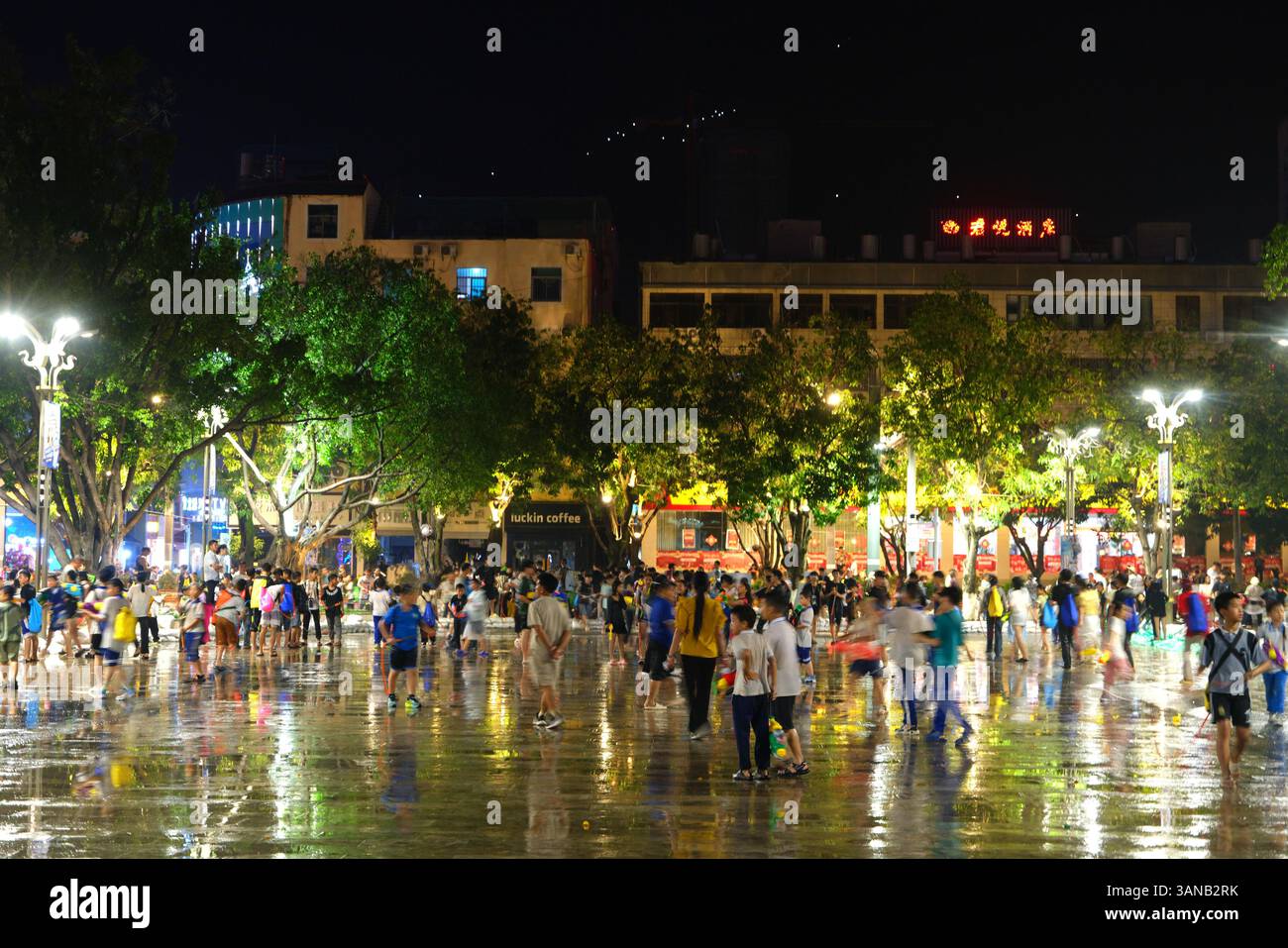 People take part in activities to celebrate the Water Splashing ...