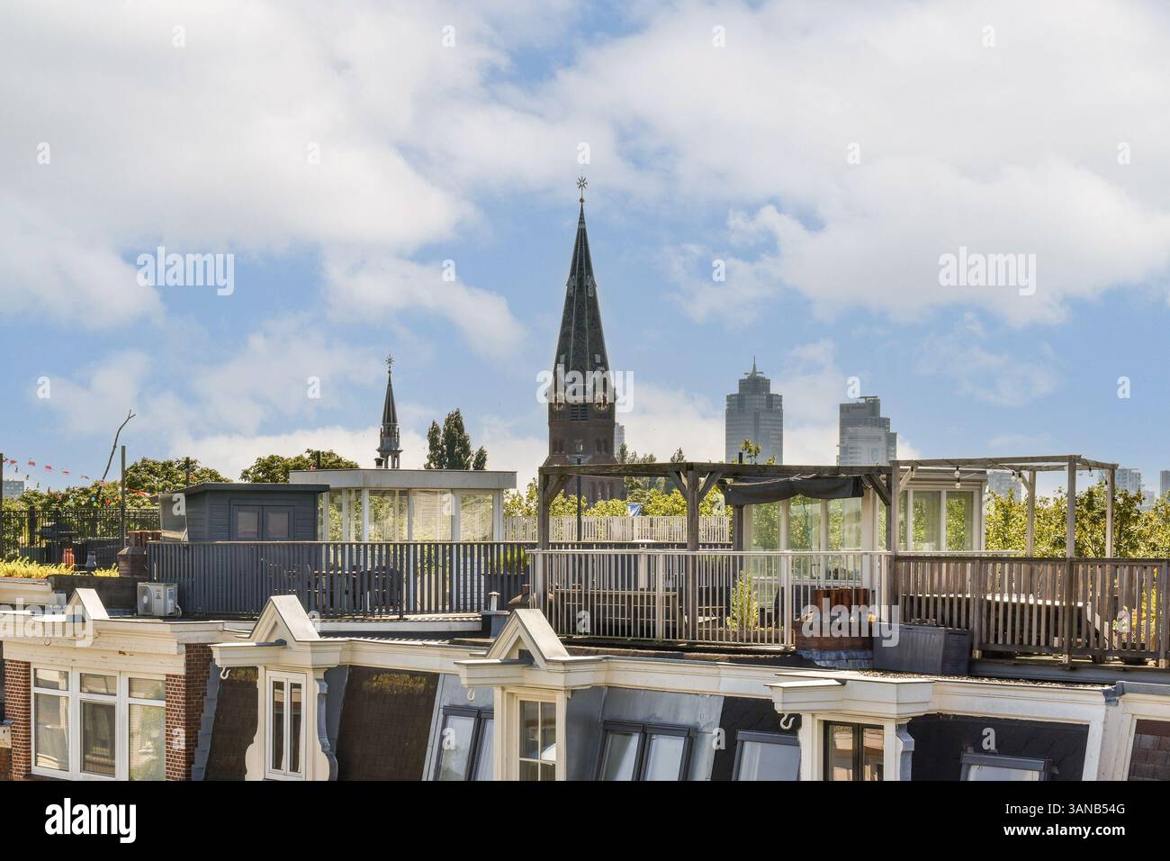 A stunning urban skyline features a tall steeple alongside modern ...