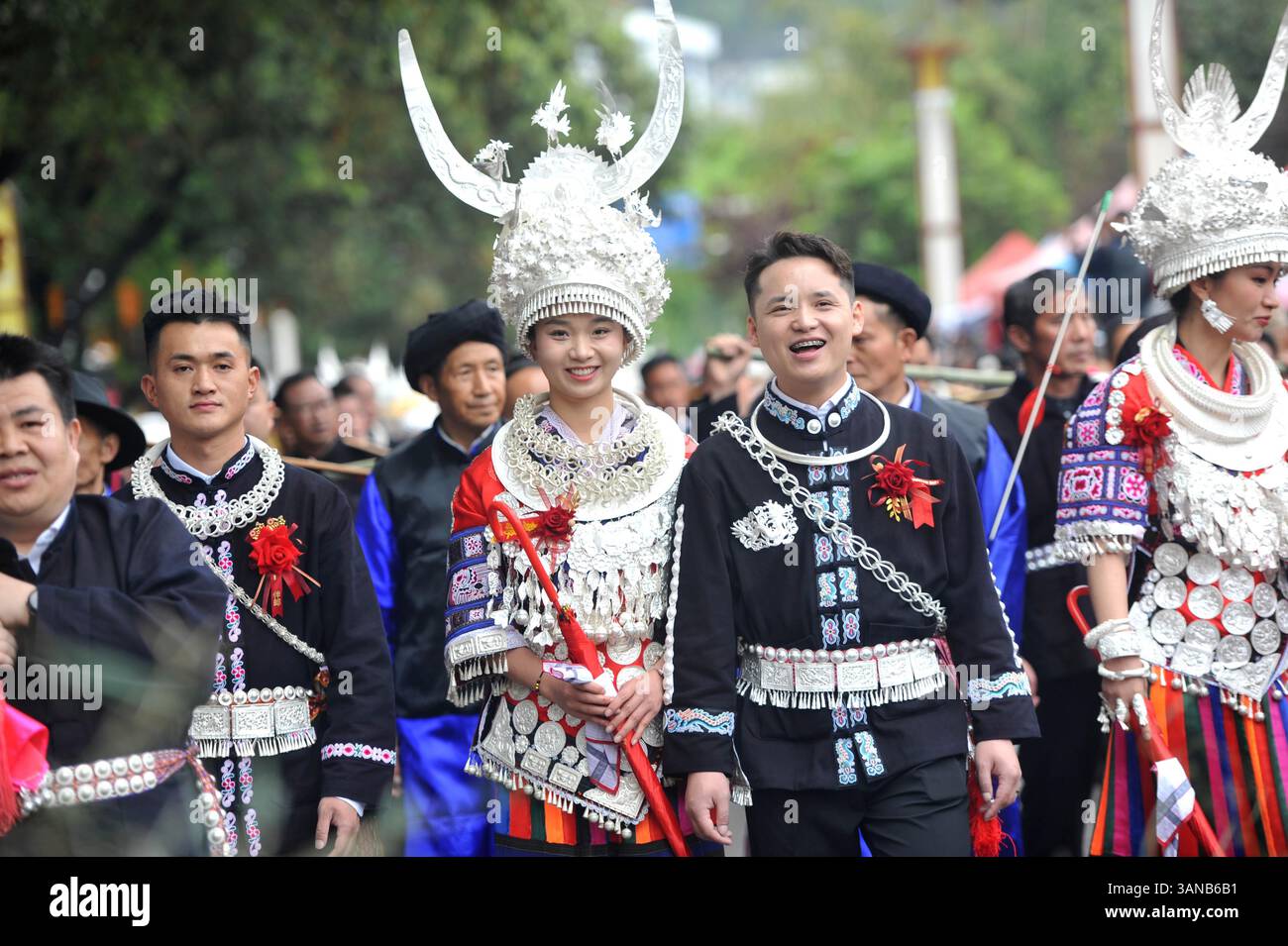 People of Miao ethnic group attend a parade to celebrate the Miao ...