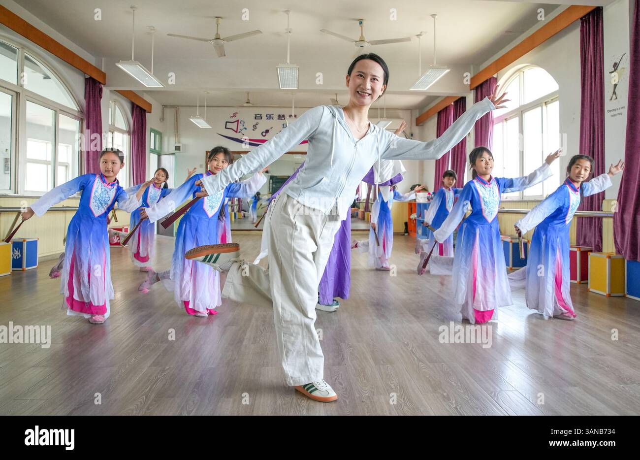 HUZHOU, CHINA - APRIL 15, 2025 - A traditional Chinese opera teacher ...