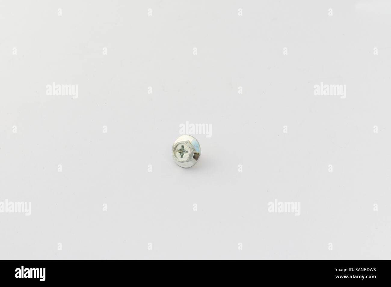 Single hex head screw on white isolated background Stock Photo - Alamy