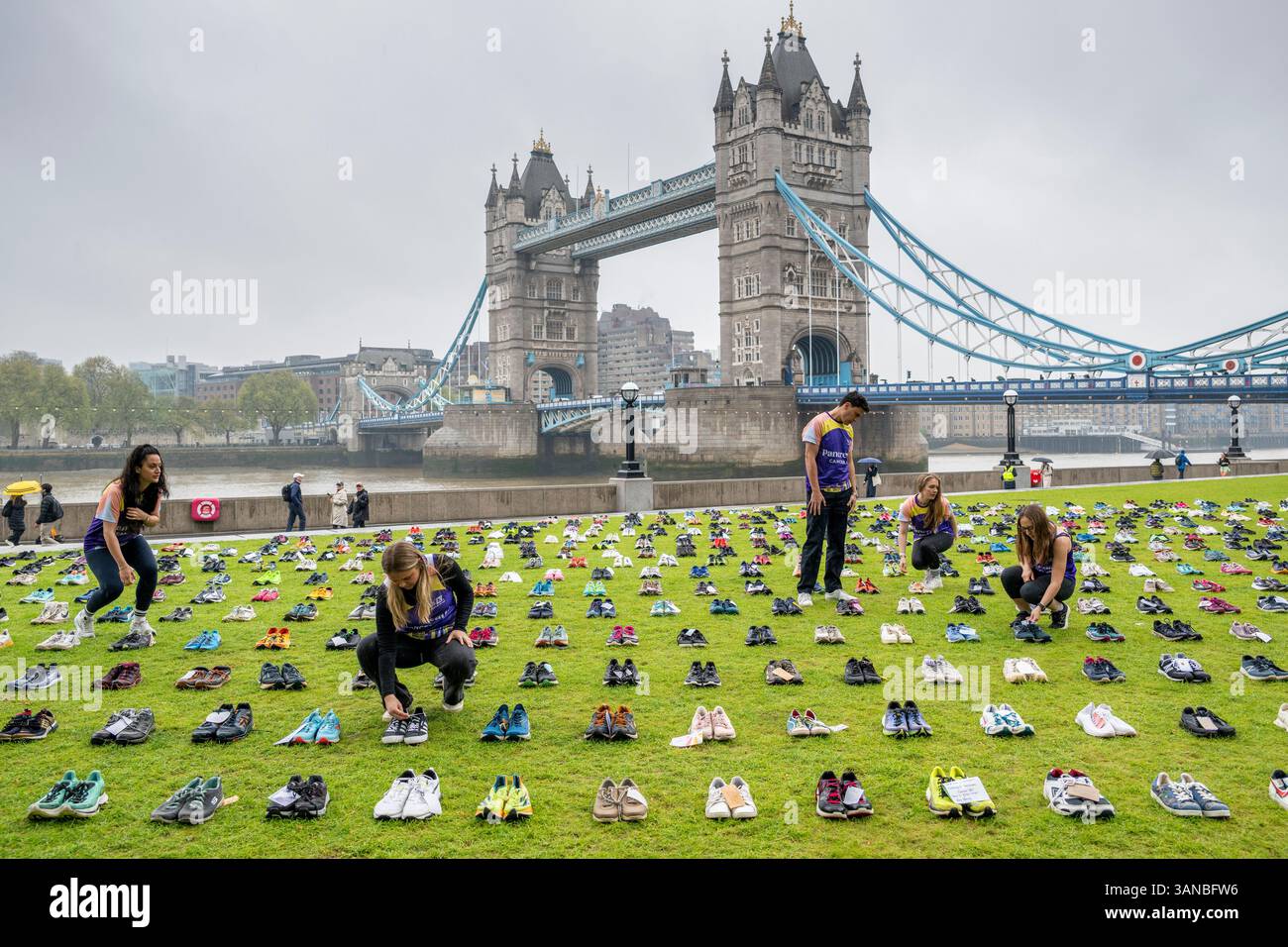 London, UK. 15 April 2025. London Marathon runners at the unveiling of ...