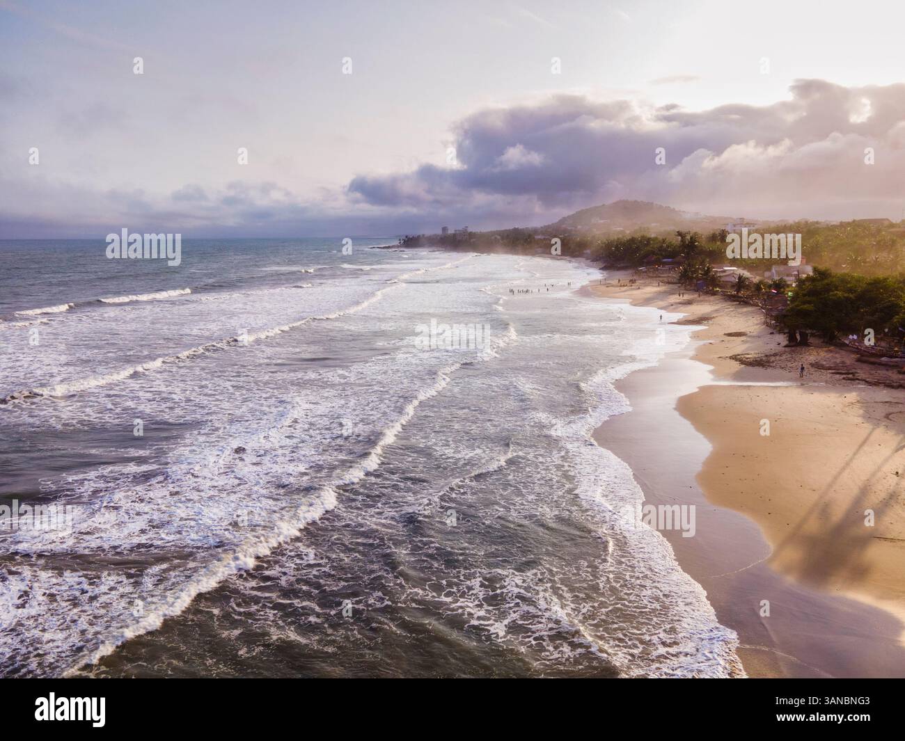 A serene view of Kokrobite Beach in Accra, Ghana, with gentle waves ...