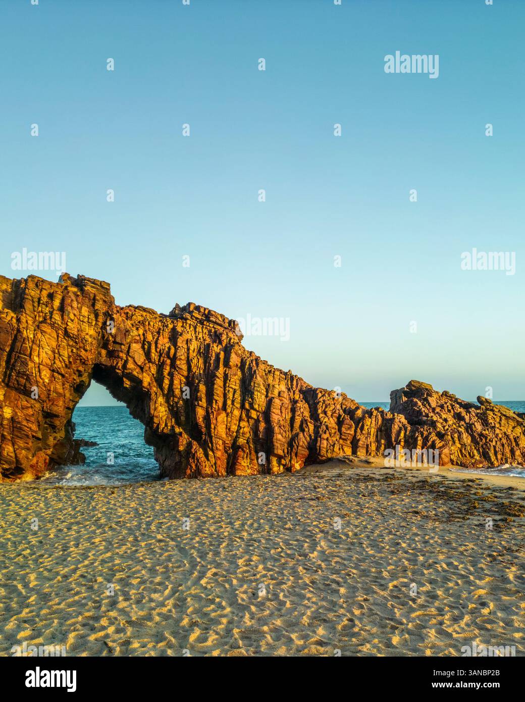 Aerial view of a natural arch along the coast in Jericoacoara, State of ...