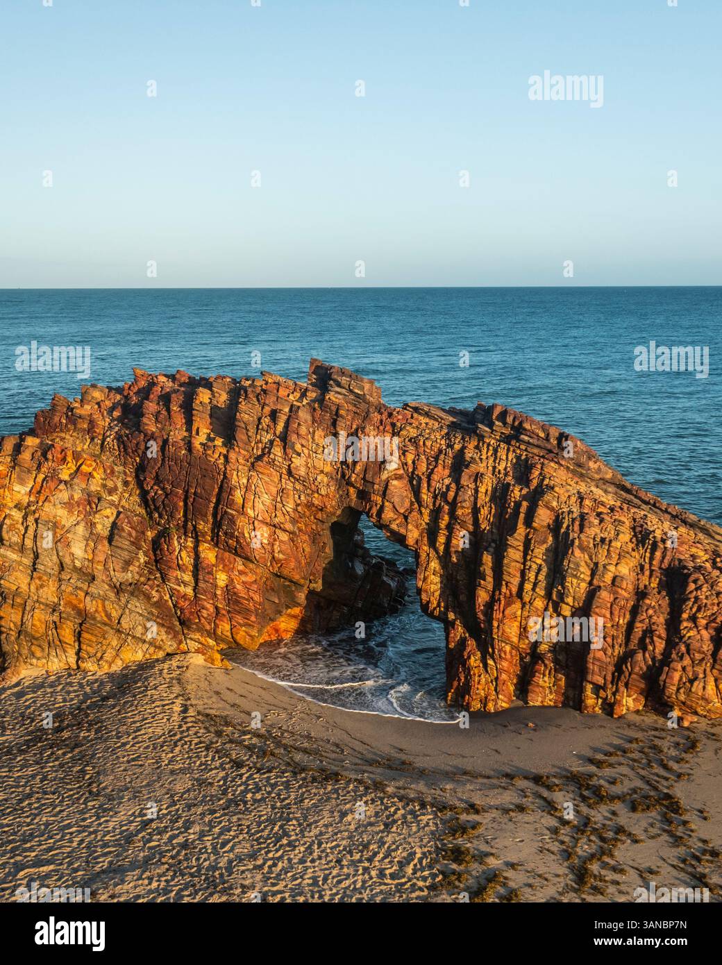 Aerial view of a natural arch along the coast in Jericoacoara, State of ...