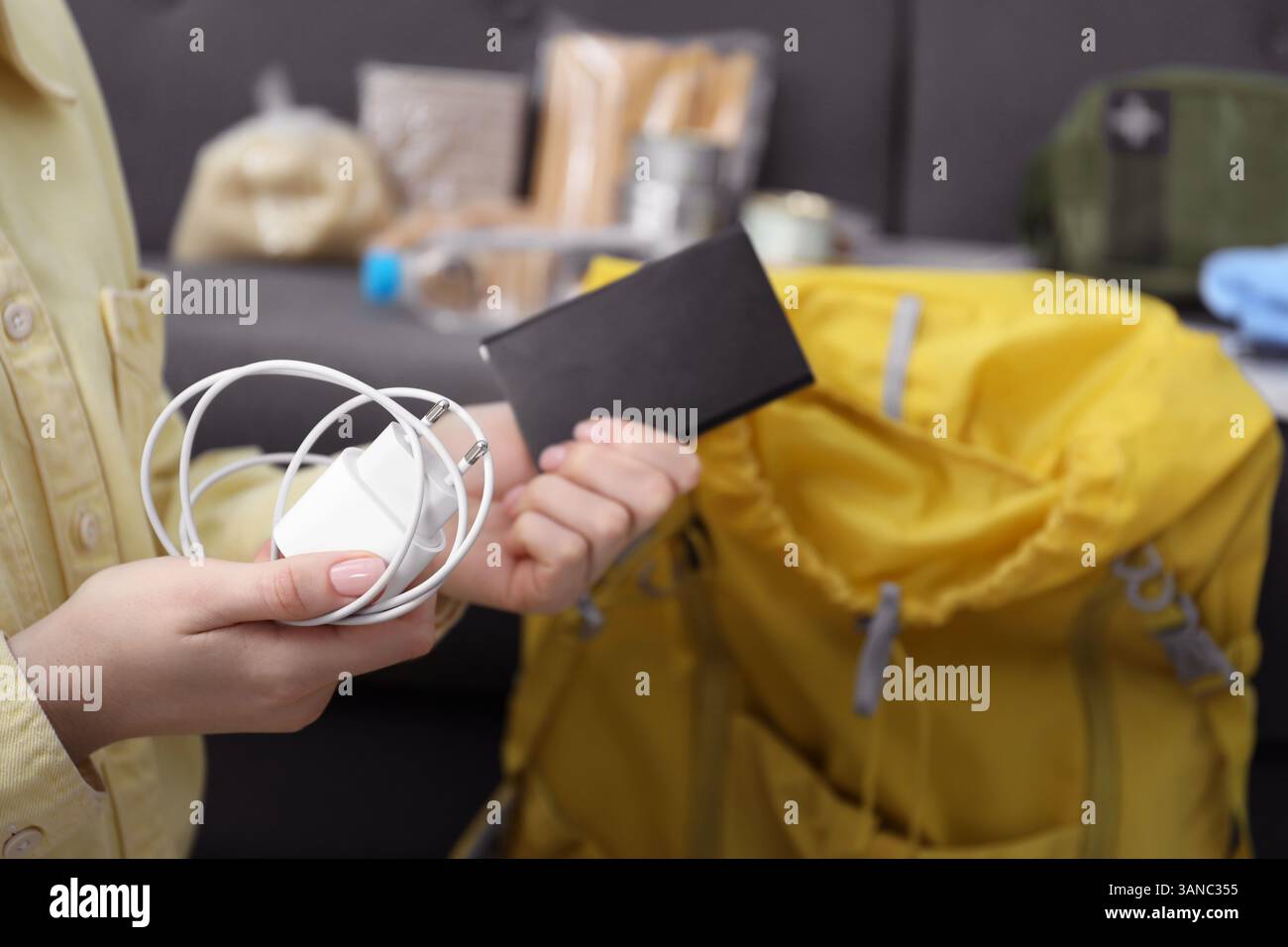 Survival kit woman packing hi-res stock photography and images - Alamy