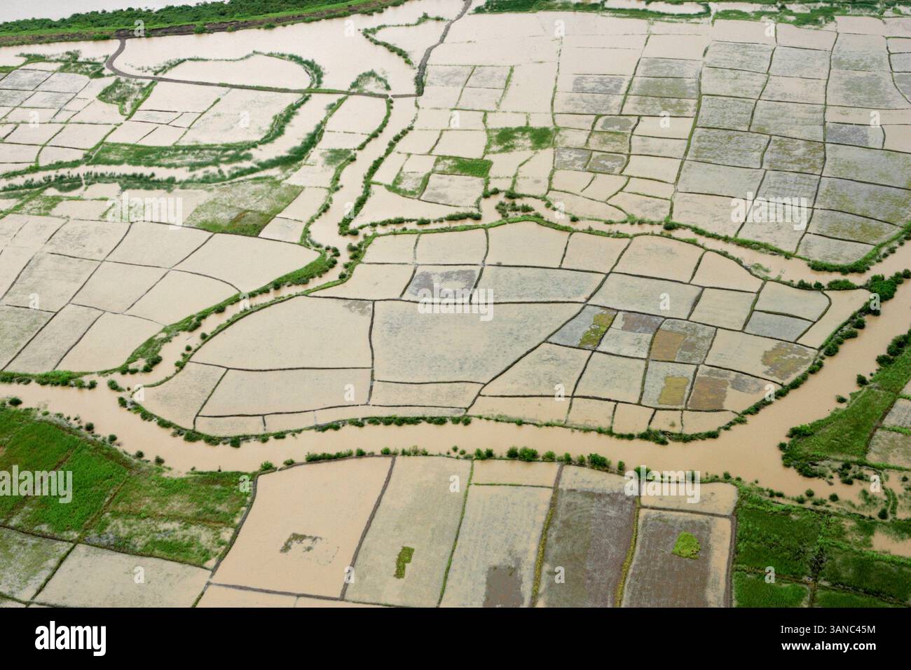 Aerial view of An aerial view of farming land immersed in water flood ...