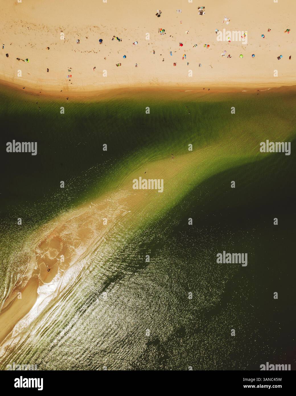 Aerial view of Praia de Figueirinha beach with clear blue water and ...