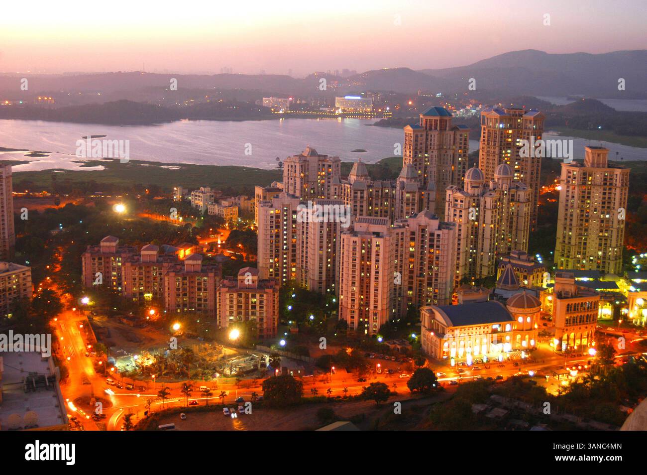 Aerial view of Aerial twilight view of Hiranandani complex with Powai ...