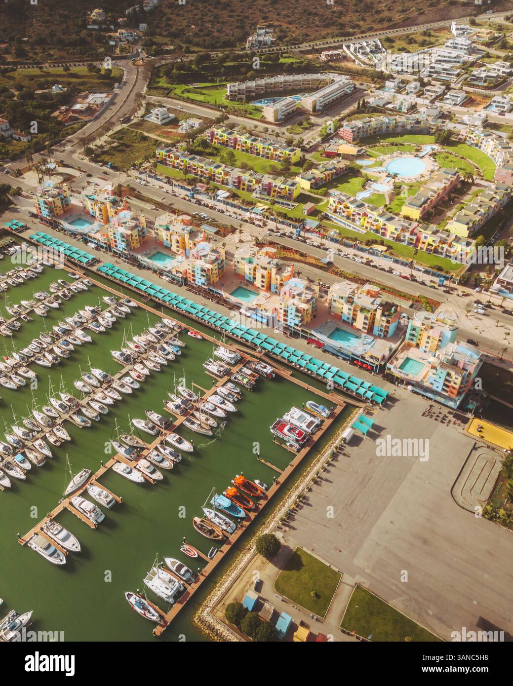Aerial view of Albufeira Port and Marina with colorful boats and ...