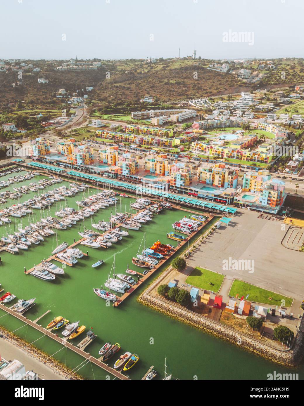 Aerial view of Albufeira Port and Marina with colorful buildings and ...