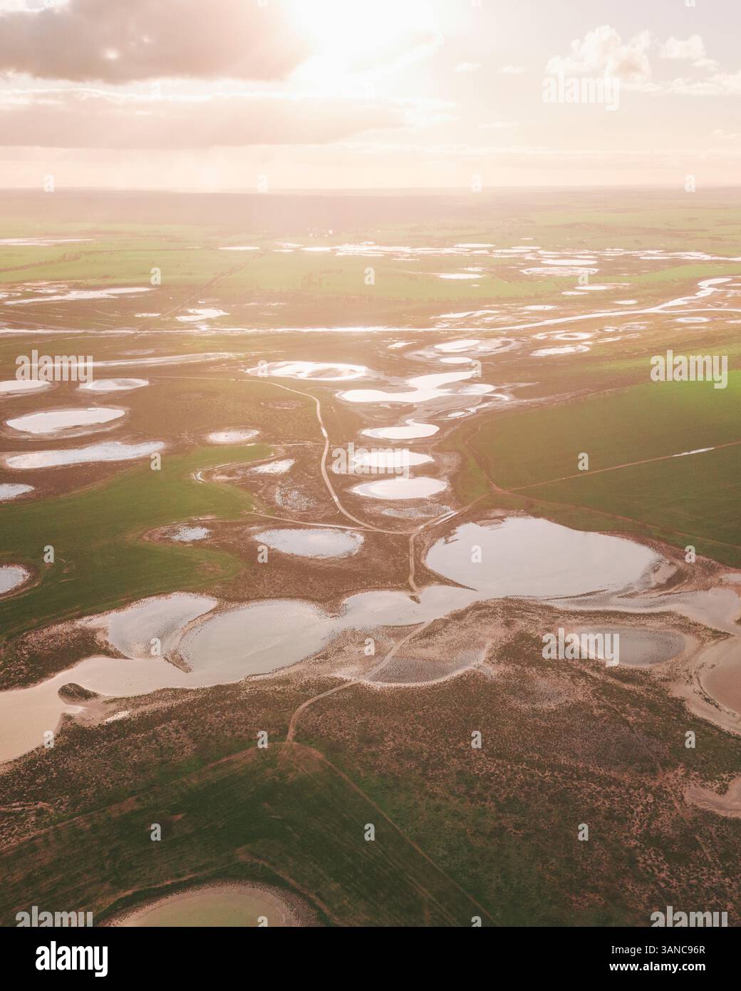 Aerial view of tranquil wetland reflecting clouds and sky at Yarra ...