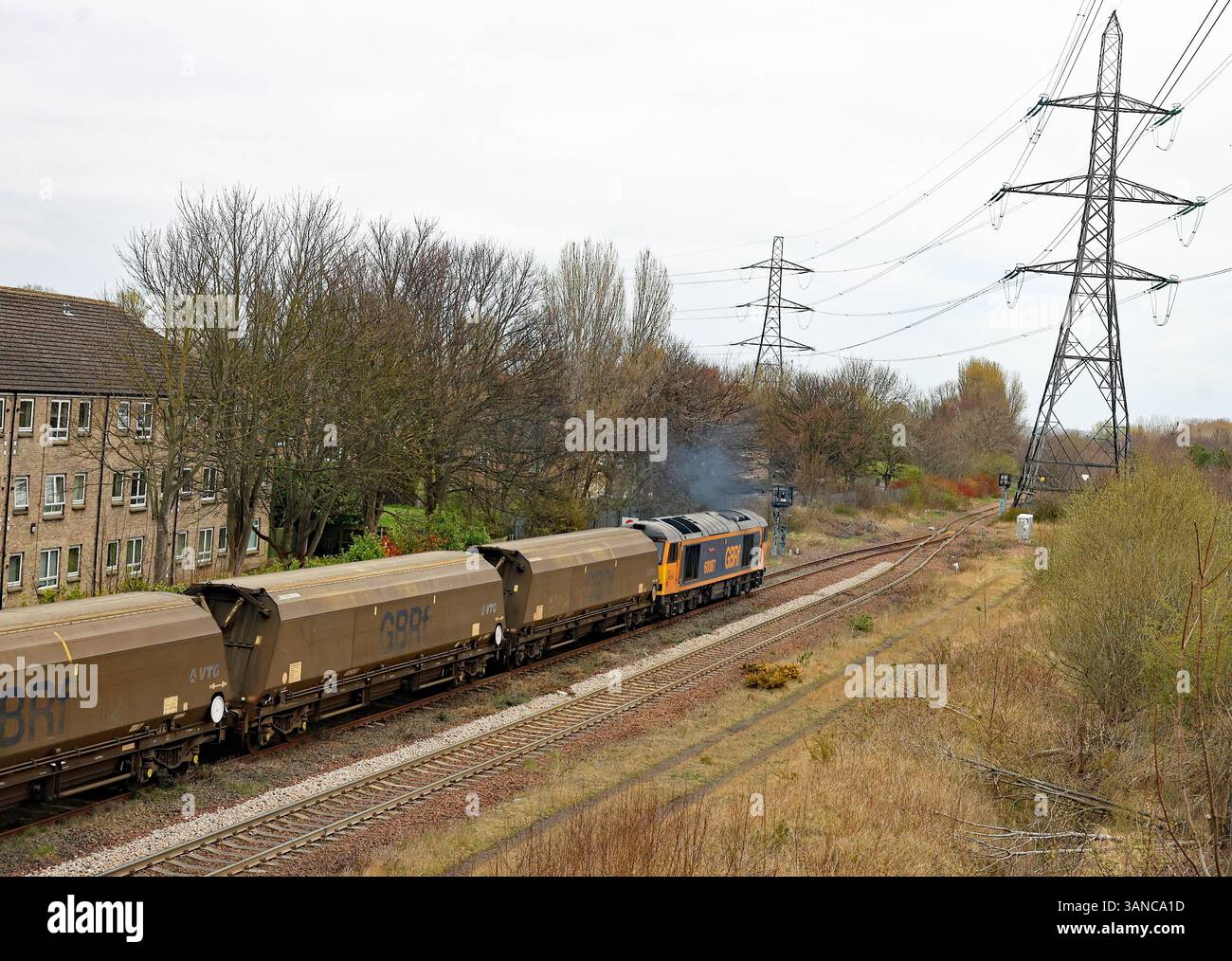 GBRf locomotive no 60087 restarts a train of empty bio mass hopper ...