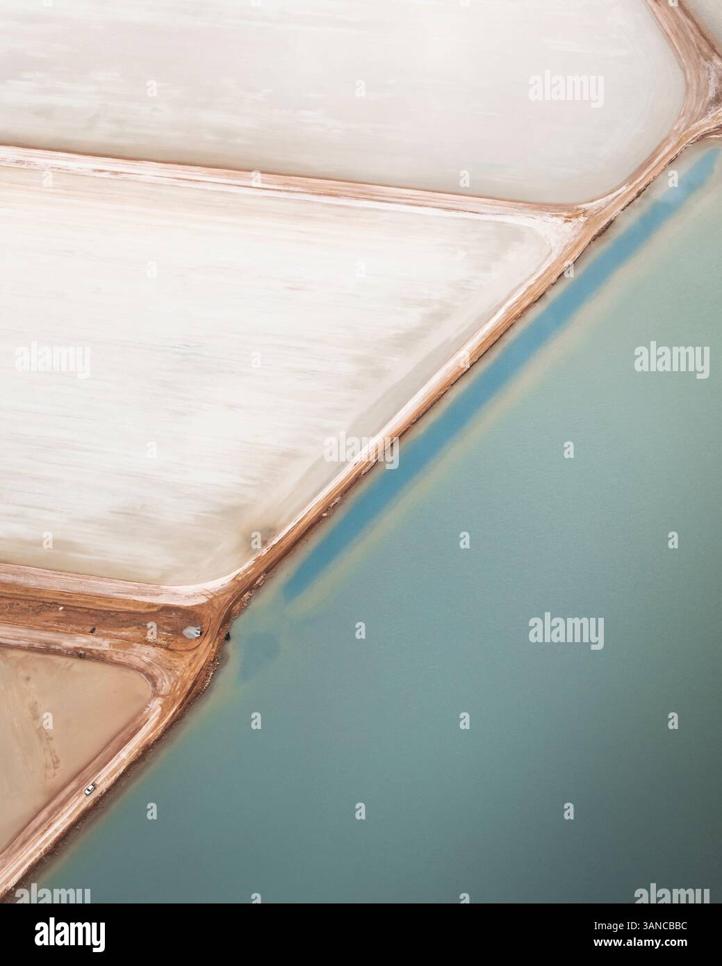 Aerial view of serene salt marshes with geometric patterns and tranquil ...