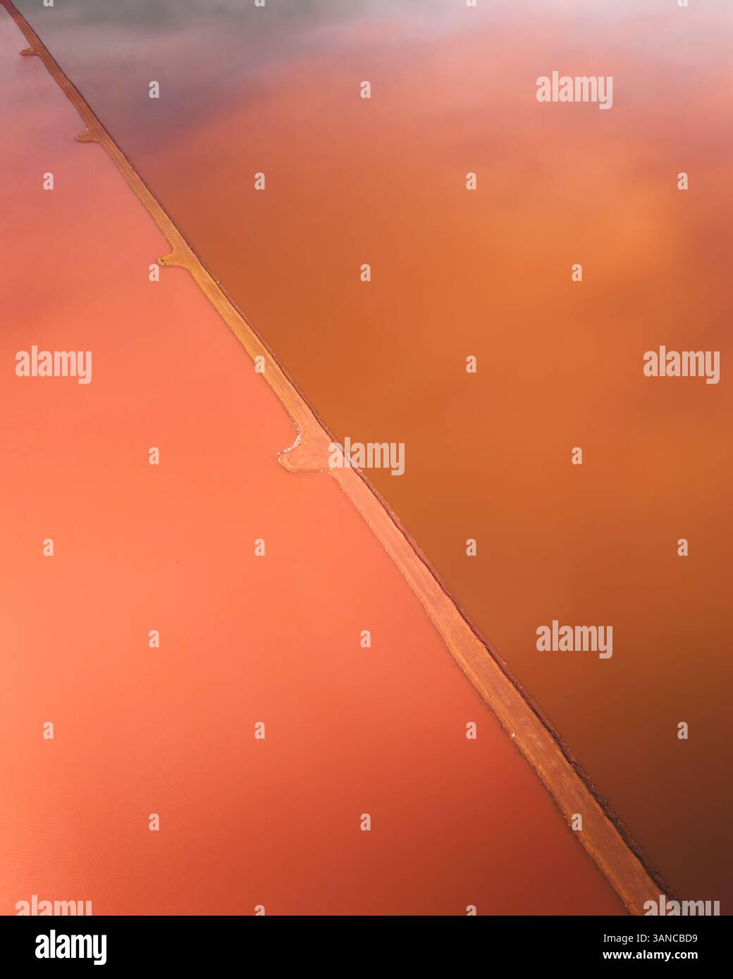 Aerial view of Hutt Lagoon, a vibrant pink lake with unique patterns ...