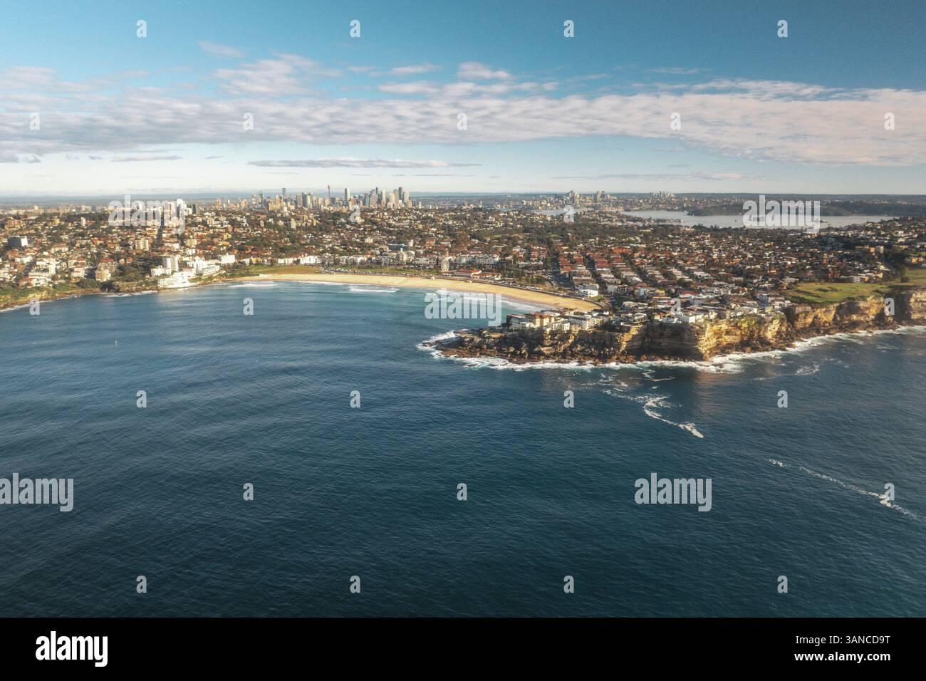 Aerial view of bondi beach with ocean waves and coastal cliffs, North ...