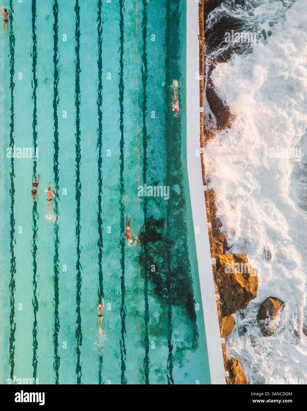 Aerial view of bondi icebergs swimming club with swimmers enjoying the ...