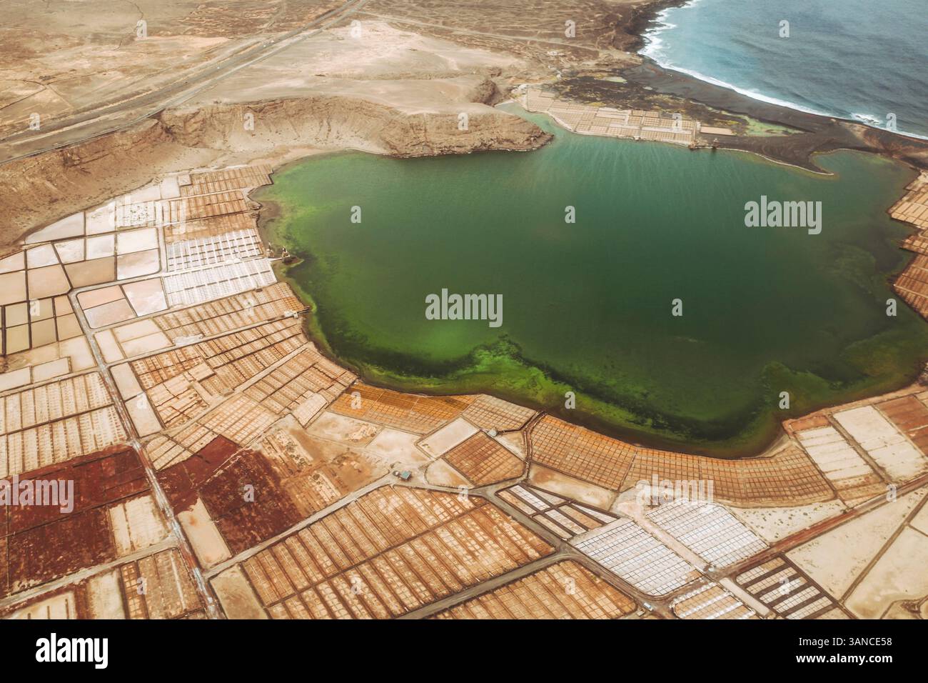 Aerial view of salt marshes and lagoon in Laguna de Janubio, Yaiza ...