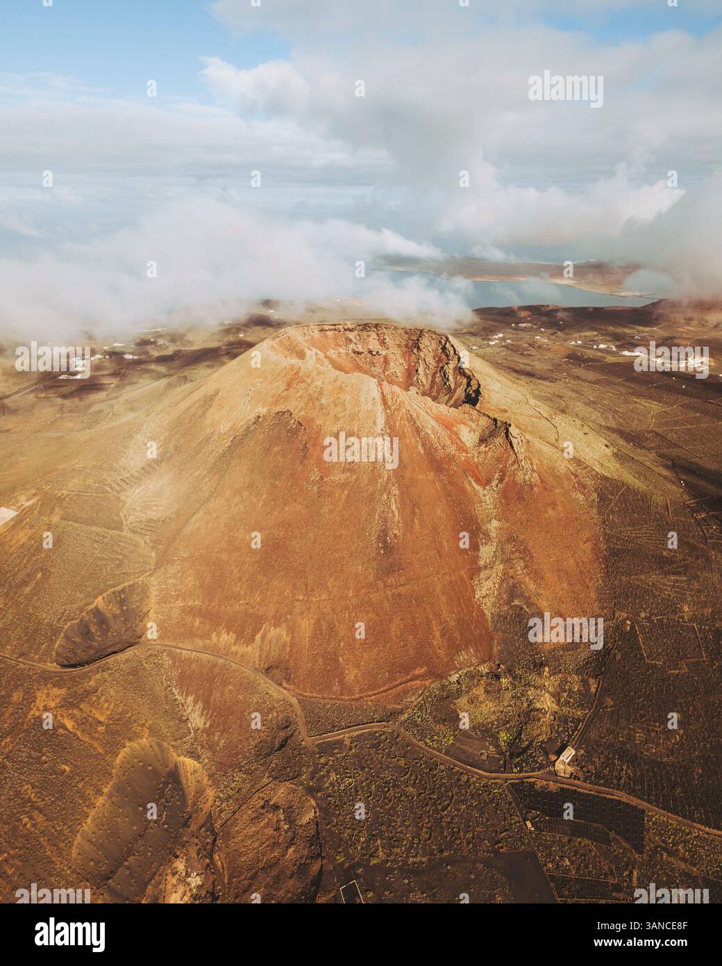 Aerial view of volcanic landscape with rugged terrain and majestic ...