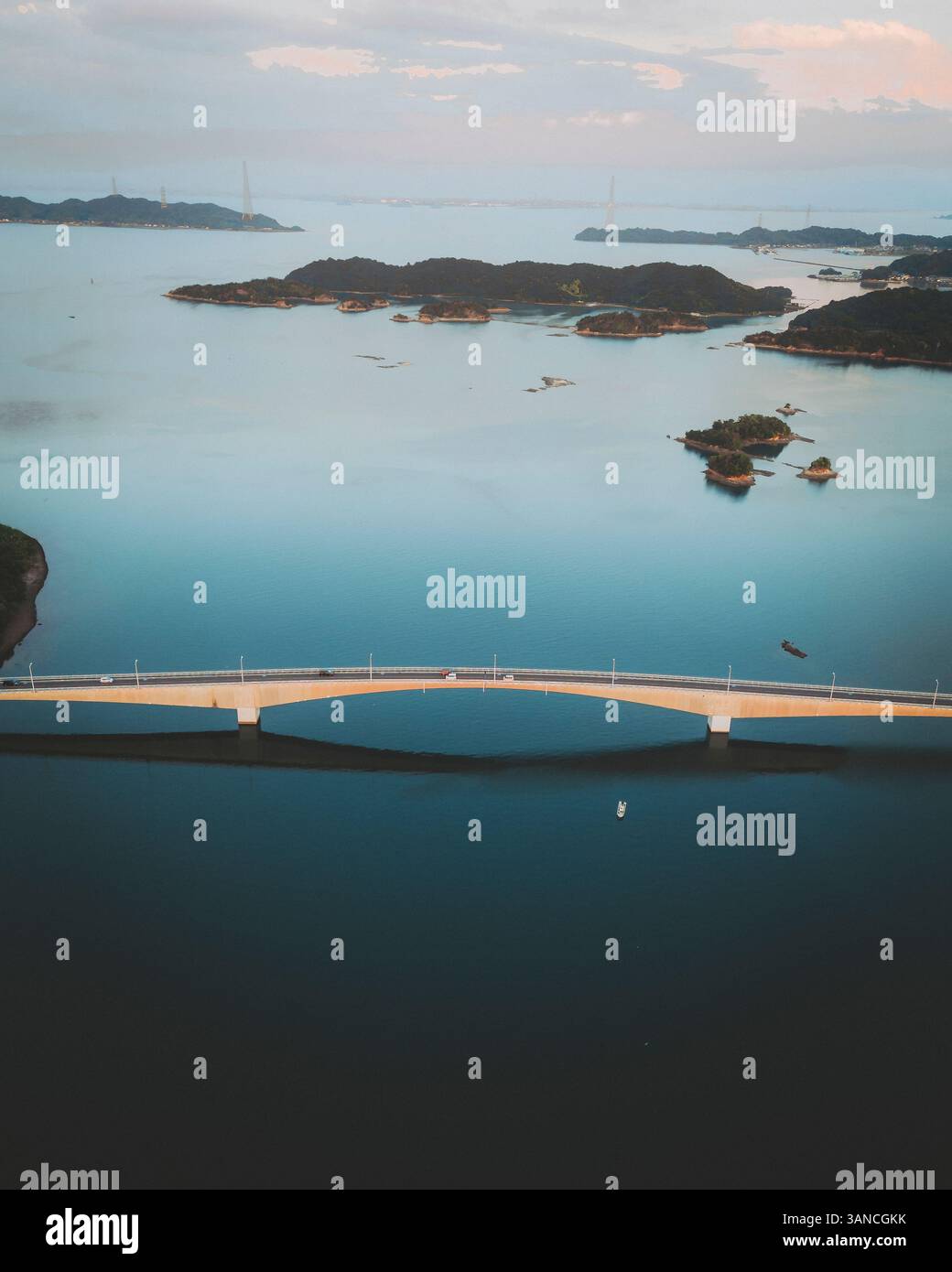 Aerial shot of a bridge in the Amakusa Islands at sunset, Kyushu, Japan ...