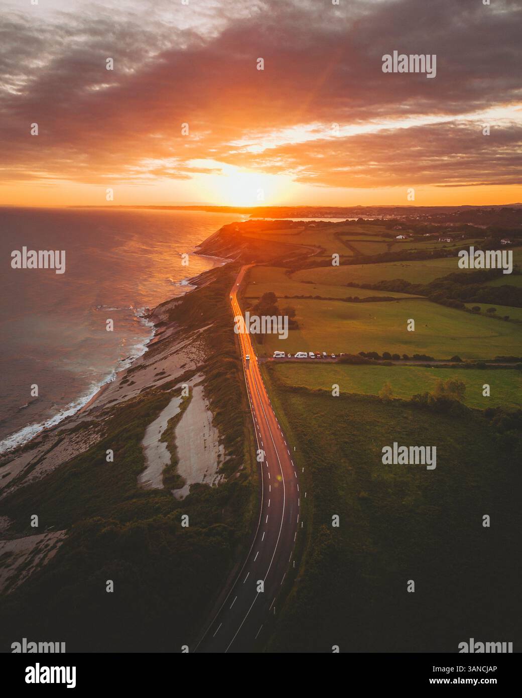 Aerial View of the Corniche Basque road at sunrise, French Basque ...