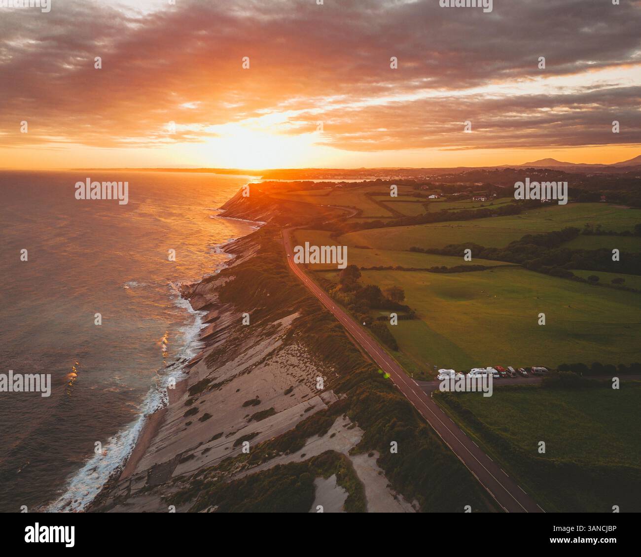Aerial View of the Corniche Basque road at sunrise, French Basque ...